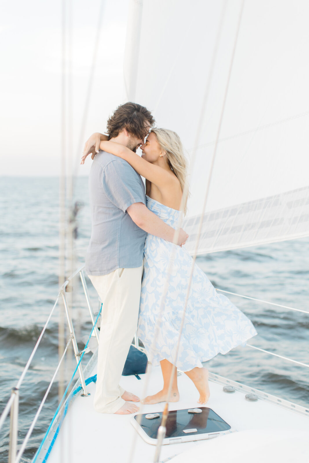 Sailboat Engagement Photos on the Coast - ashleyclarkepavlickphotography.com